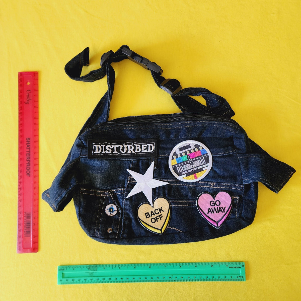 Recycled Denim moonbag with patches